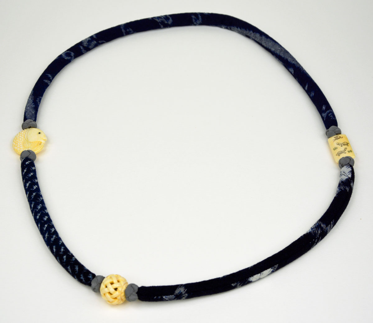 Necklace with 3 bone beads, ikat rope – The Ren Brown Collection Gallery